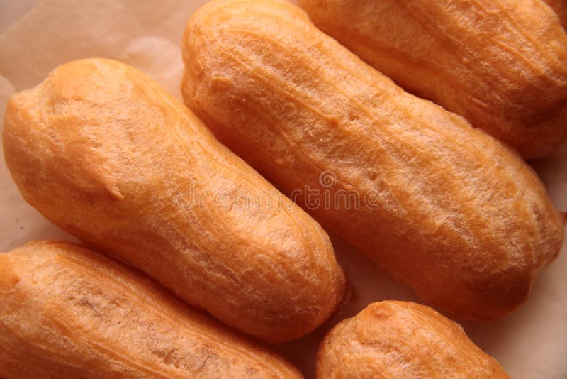 Long Rows Eclair Shells. Eclairs Candy Paper. the Process of Making ...