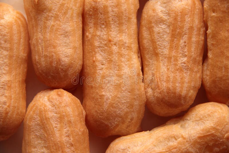 Long Rows Eclair Shells. Eclairs Candy Paper. the Process of Making ...