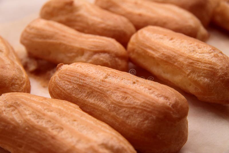 Long Rows Eclair Shells. Eclairs Candy Paper. the Process of Making ...