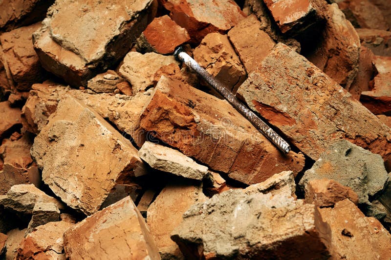 Long Rusty Metal Bolt Reinforcement among Broken Bricks Stock Photo ...