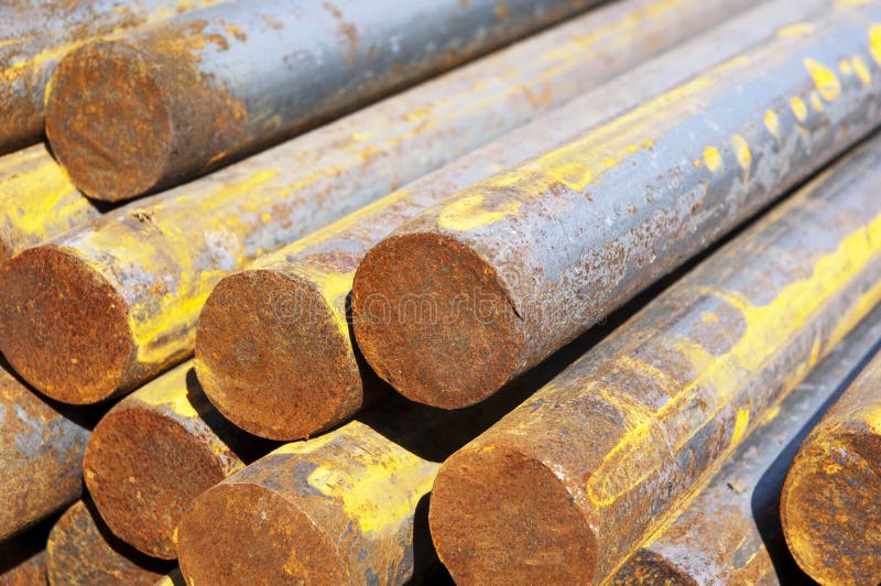 Long rusty steel rods stock image. Image of diminishing - 29436059