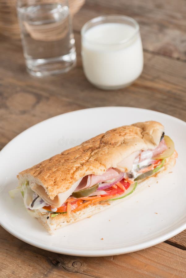 Long Sandwich with Ham, Cheese, Tomatoes, Red Onion and Lettuce. Stock ...
