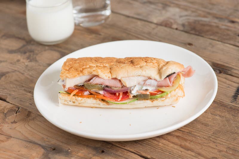 Long Sandwich with Ham, Cheese, Tomatoes, Red Onion and Lettuce. Stock ...