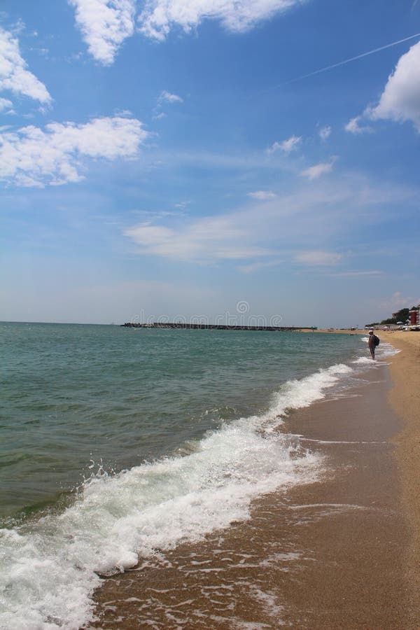 Long Sandy Beach on the Beach. Sunny Weather with a Few Clouds I ...