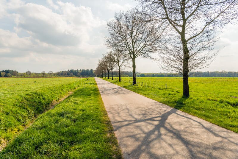 Long Seemingly Endless Straight Road in a Flat Landscape Stock Image ...