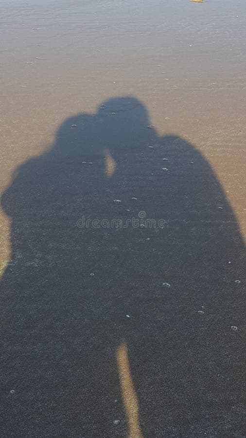 Shadow of couple stock photo. Image of girl, shadow, cuddle - 35203348