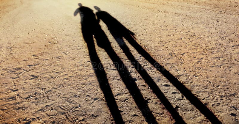 Two People Holding Hands Silhouette at Tunnel Love and Together Stock ...