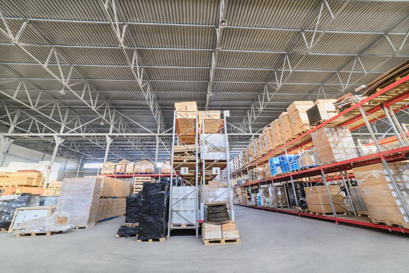 Long Shelves with a Variety of Boxes and Containers. Stock Photo ...