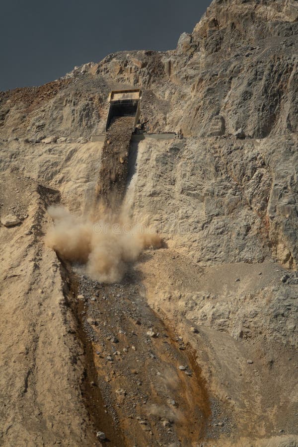 Dumper Unloading Stones from Mine To Dump Stock Photo - Image of ...