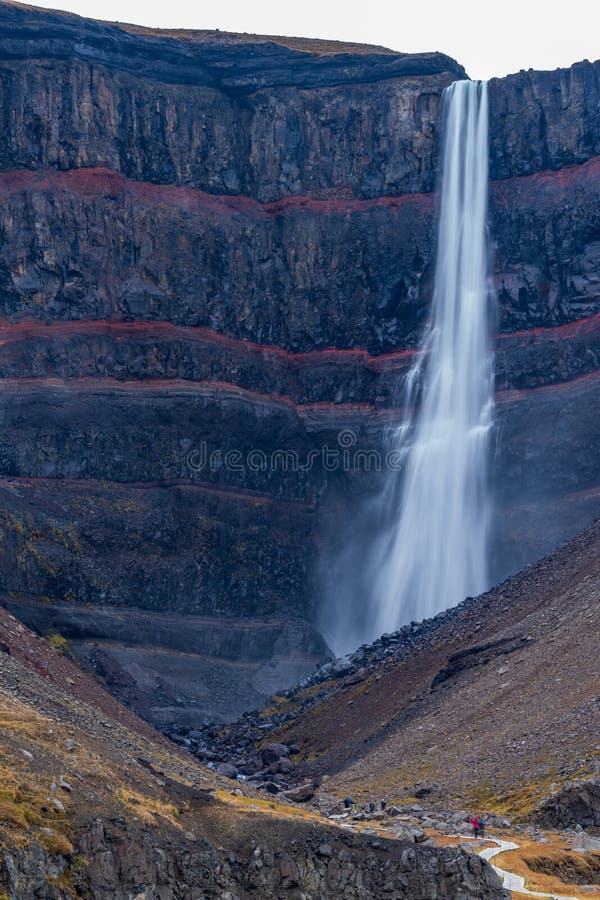 Hengifoss Waterfall with Red Lines in the Rocks, Long Exposure Stock ...