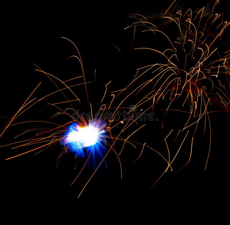 Long Sparks of Fire on a Black Background Stock Photo - Image of flash ...