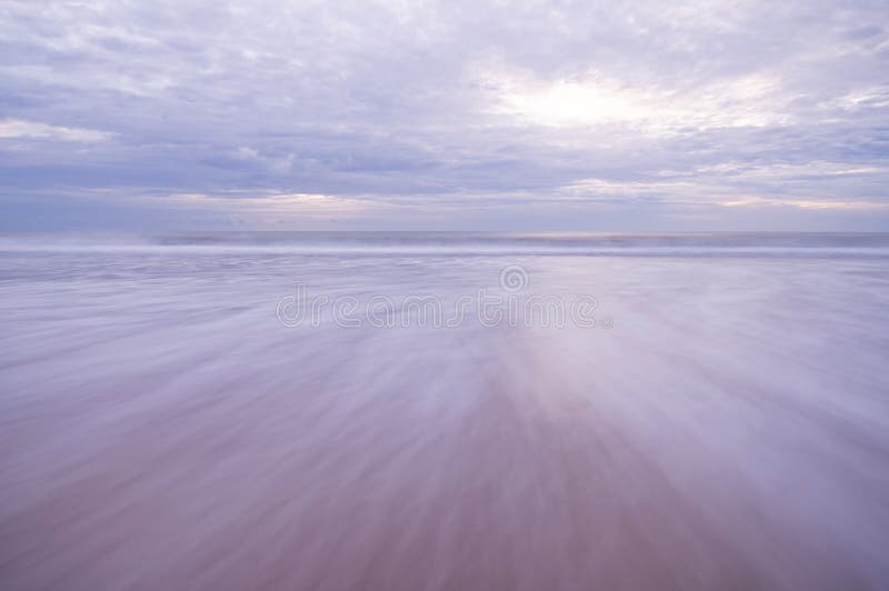 Long Speed Shutter of Tropical Sandy Beach with Sky and Clouds Over Sea ...