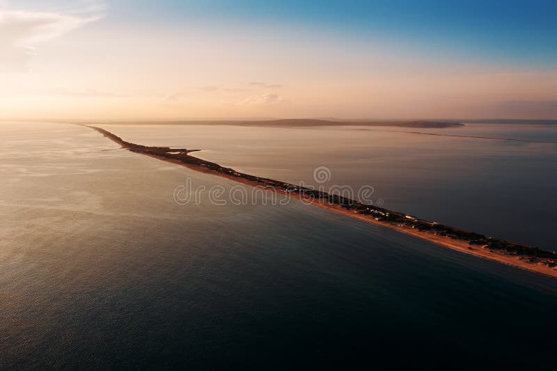 Long Spit with Sandy Beach between Sea and Liman at Sunset, Aerial View ...