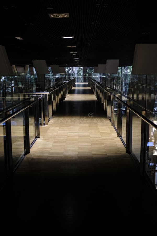 Long Straight Corridor on a Dark Interior Scene Building Stock Image ...