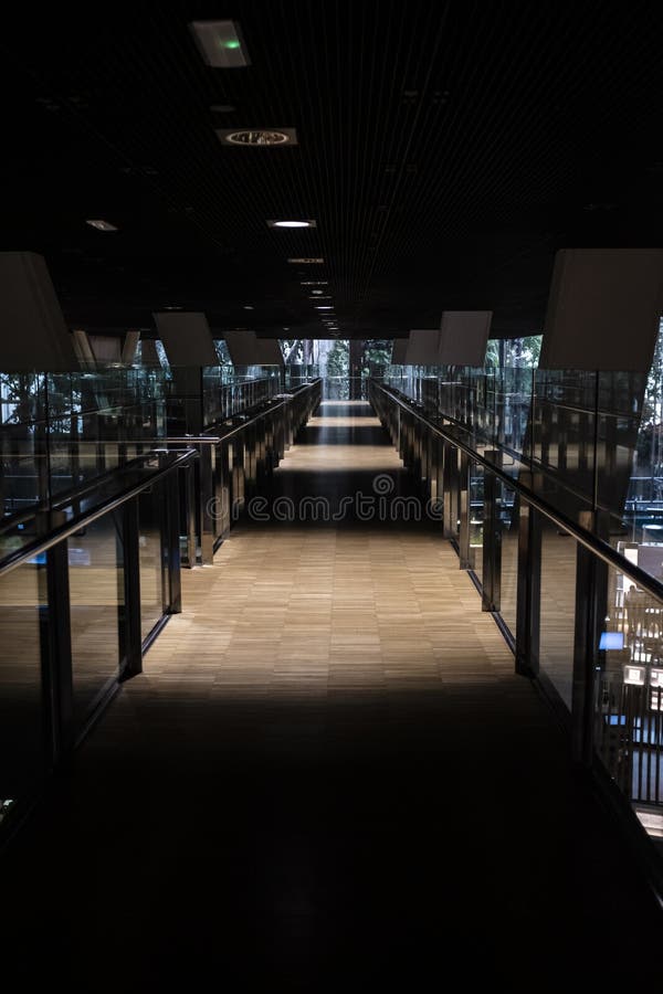 Long Straight Corridor on a Dark Interior Scene Building Stock Image ...