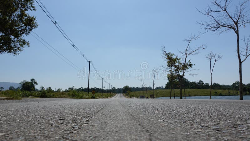 Long Stretch of Empty Highway with Solid Yellow Line on the Road in the ...