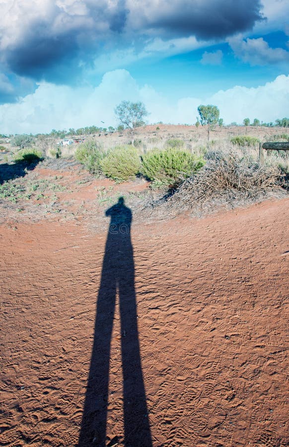 Long Sunset Shadow of a Man in the Desert Stock Image - Image of ...