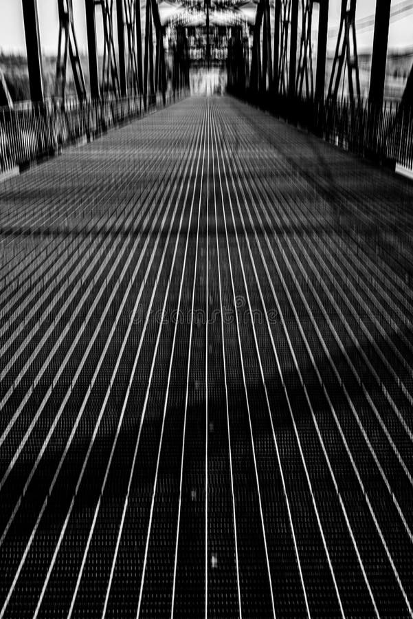 A Long Suspension Bridge with Shadows Along it from the Structures ...