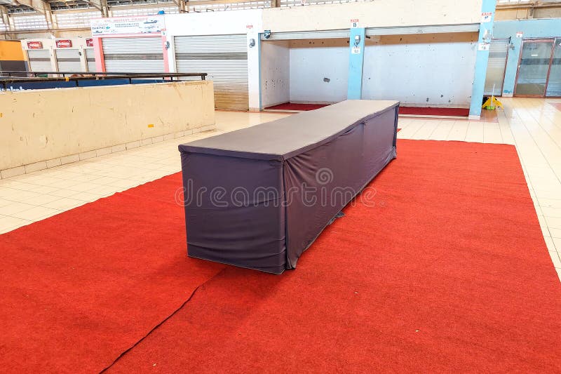 Long Table on the Floor with a Deep Red Mat, Room Editorial Stock Image ...