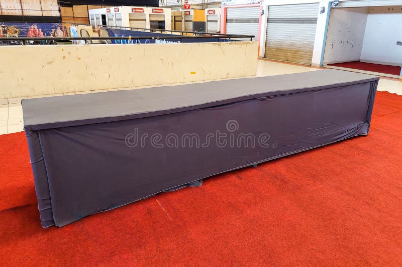 Long Table on the Floor with a Deep Red Mat, Room Editorial Image ...