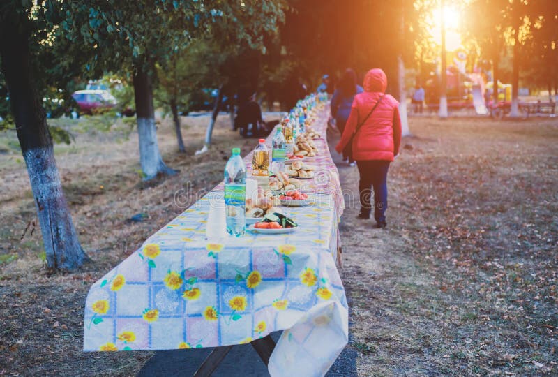 Long Table with Food and Drink Outside Stock Image - Image of setting ...