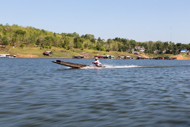 Long tail boat driver editorial photo. Image of cultural - 32783351