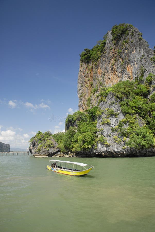 Long tail boat in Thailand stock image. Image of rock - 3659655
