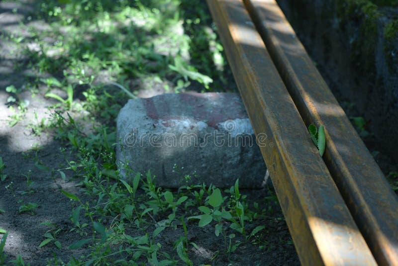 A Long, Thick, Metal Profile with a Small Amount of Red Rust Located on ...