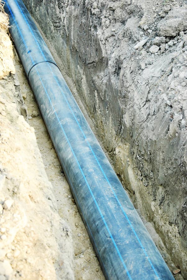 Long thick pipe stock image. Image of ditch, repair, water - 21573109