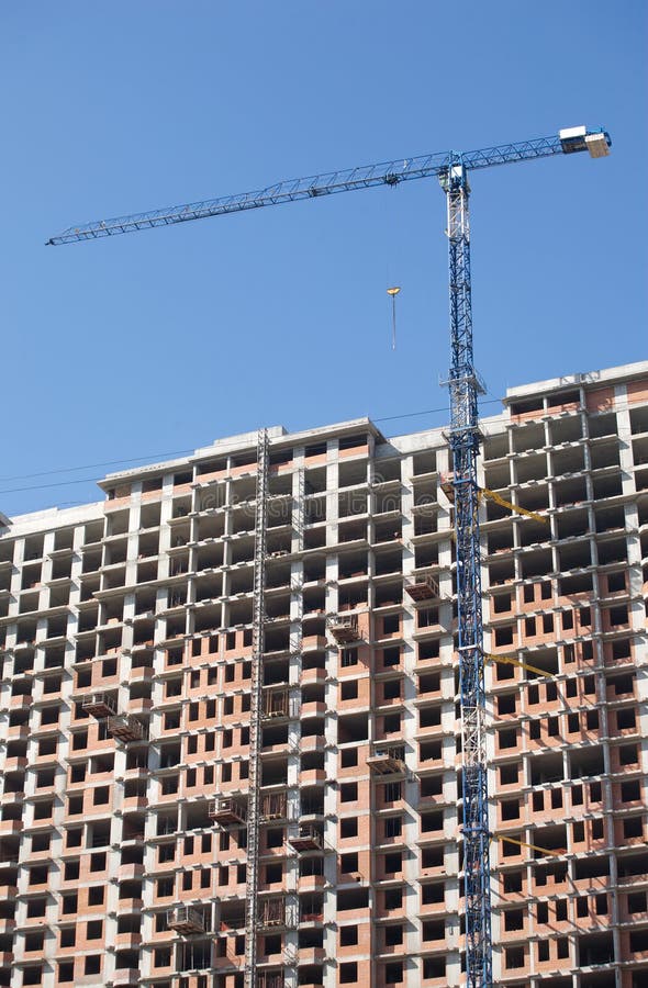 Long Tower Crane and Top of Construction Building Stock Image - Image ...