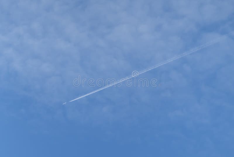 A Long Trail of Jet Plane on Blue Sky Stock Image - Image of tourism ...