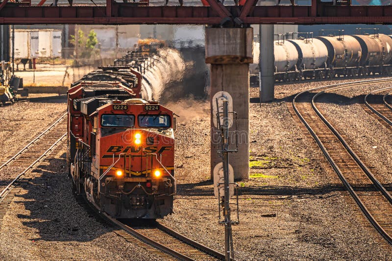 Long Train with Multiple Cars on Its Tracks Editorial Stock Image ...
