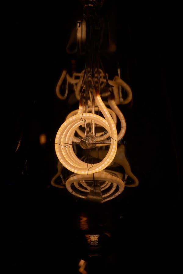 Long Tube-shaped Edison Lamp, Bulb, Black Background. Stock Photo ...