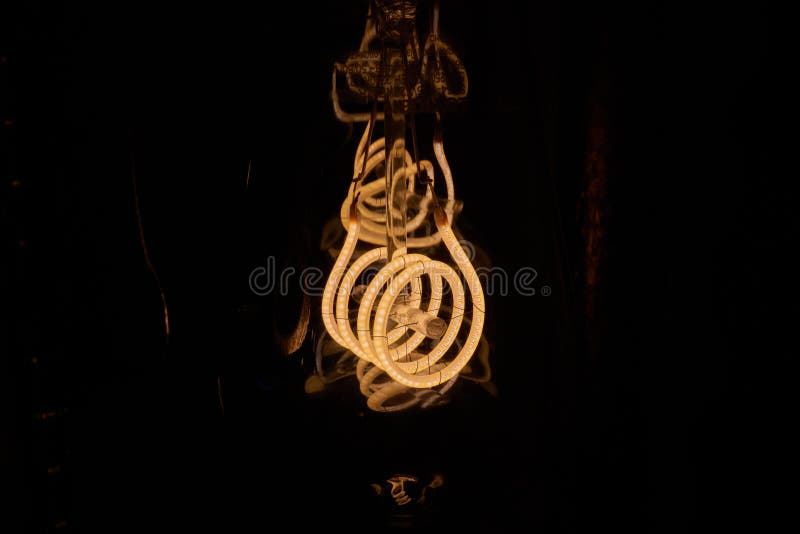 Long Tube-shaped Edison Lamp, Bulb, Black Background. Stock Photo ...