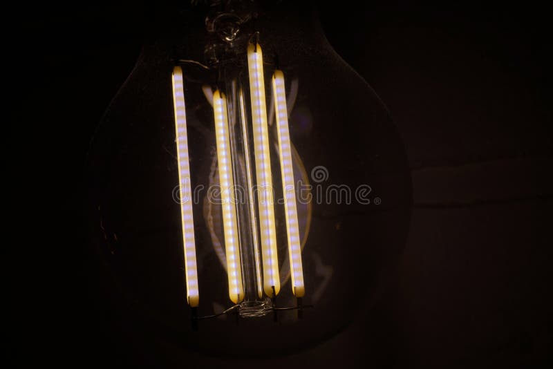 Long Tube-shaped Edison Lamp, Bulb, Black Background. Stock Image ...