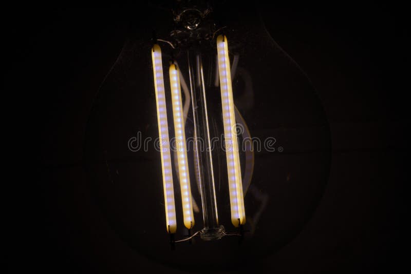 Long Tube-shaped Edison Lamp, Bulb, Black Background. Stock Photo ...