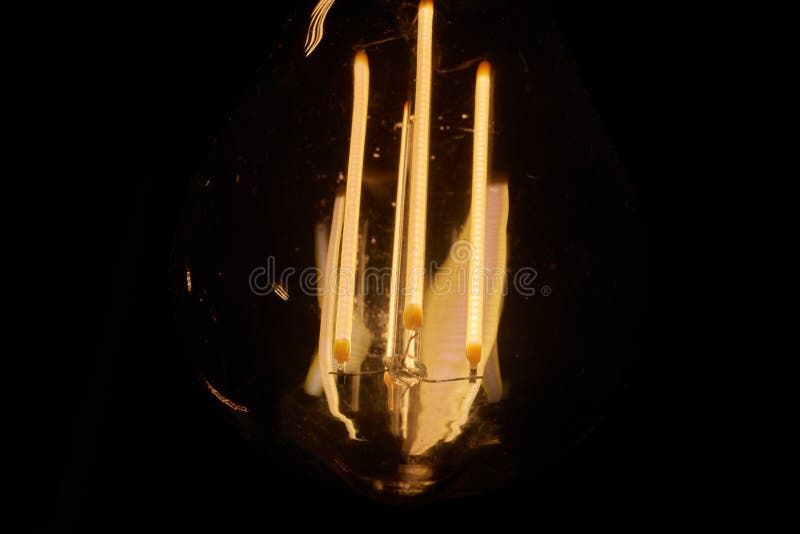 Long Tube-shaped Edison Lamp, Bulb, Black Background. Stock Image ...