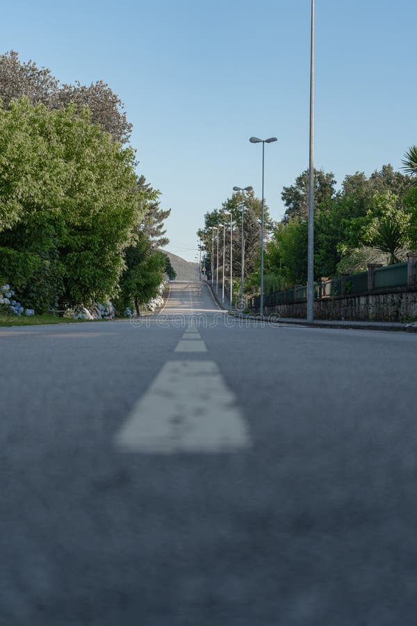 Long upward sloping road. stock image. Image of city - 230641983