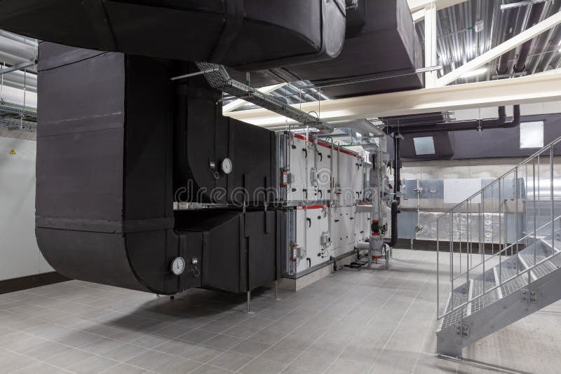 An Long Ventilation Pipe in a Technical Room in the Basement of a Large ...