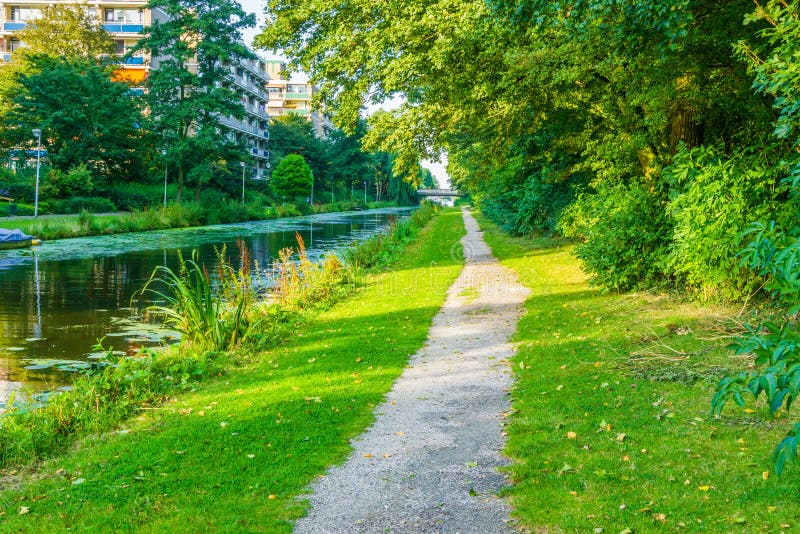 Long Walking Path in Beautiful Water Lake Park Landscape Stock Image ...