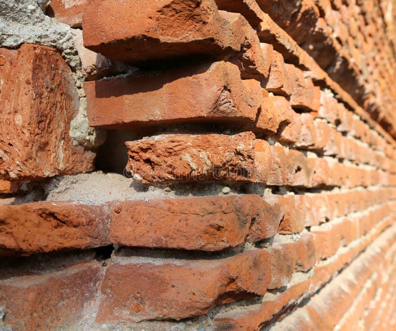 Long wall made with bricks stock image. Image of olden - 106016389