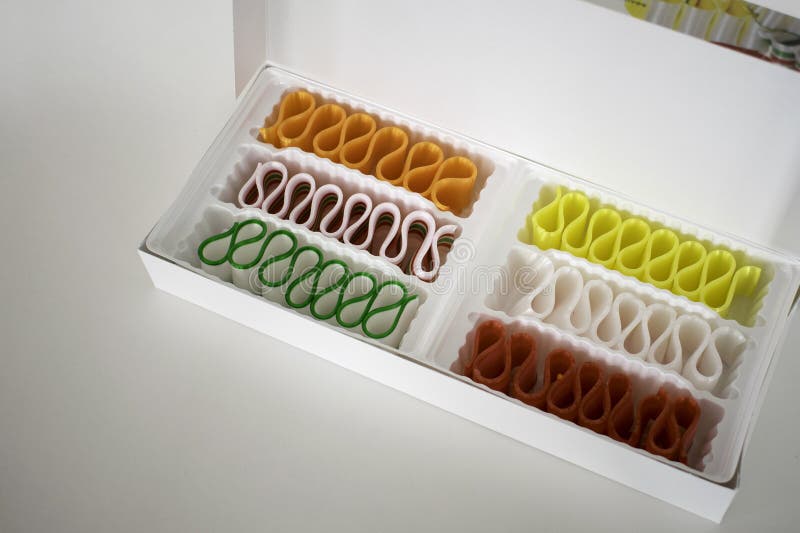 White Box Contains Rows of Colorful Ribbon Candy Stock Image - Image of ...