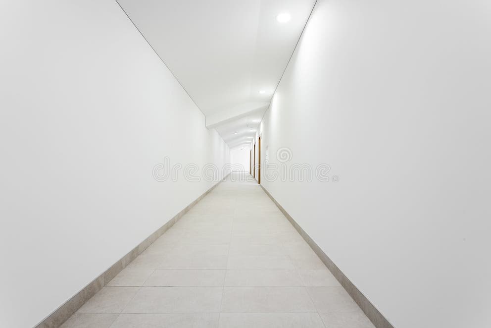 Long white clean hallway stock image. Image of commercial - 80685903