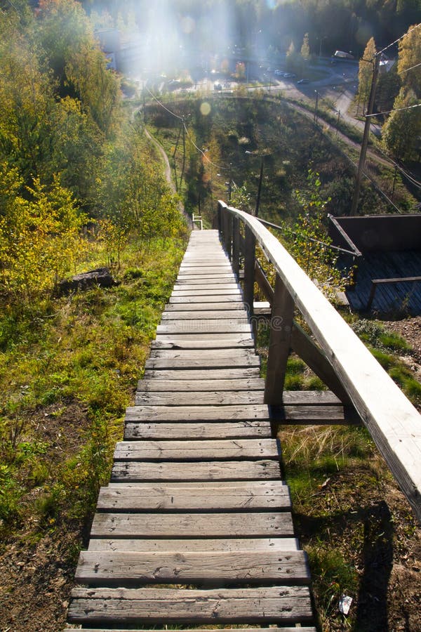 Long Wood Stairs Down from Top of Bush-covered Hill Stock Image - Image ...