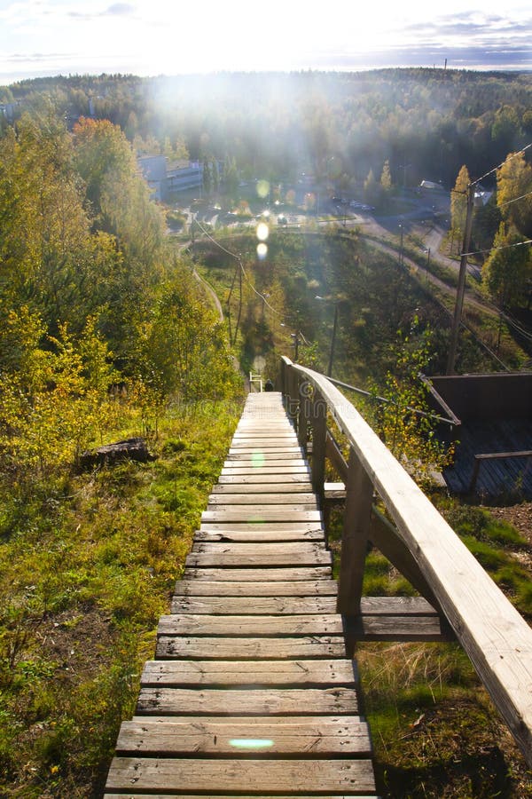 Long Wood Stairs Down from Top of Bush-covered Hill Stock Image - Image ...