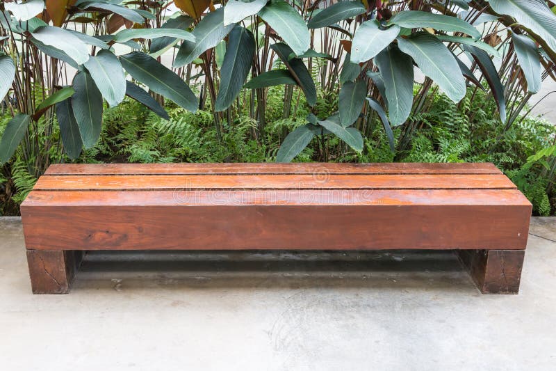 Long wooden bench stock image. Image of fresh, plant - 58654411