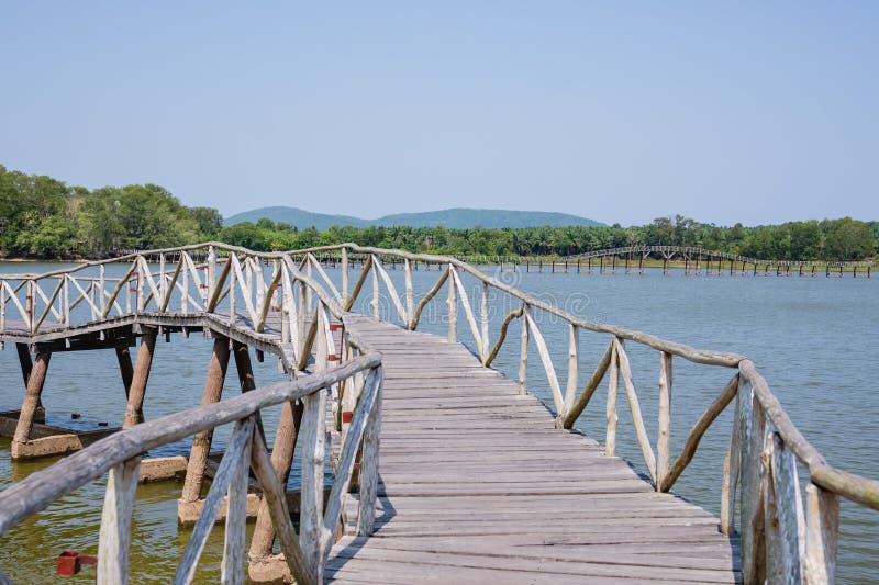 A Long Wooden Bridge Extending into the Reservoir Stock Image - Image ...