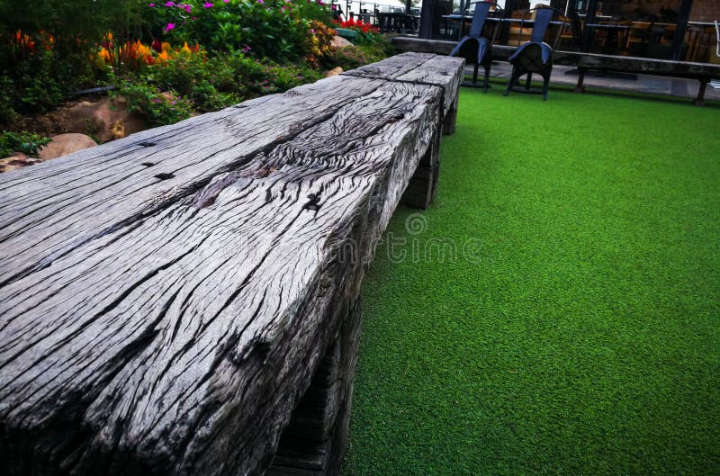 Long Wooden Chair Made by Log on Artificial Grass Stock Photo - Image ...