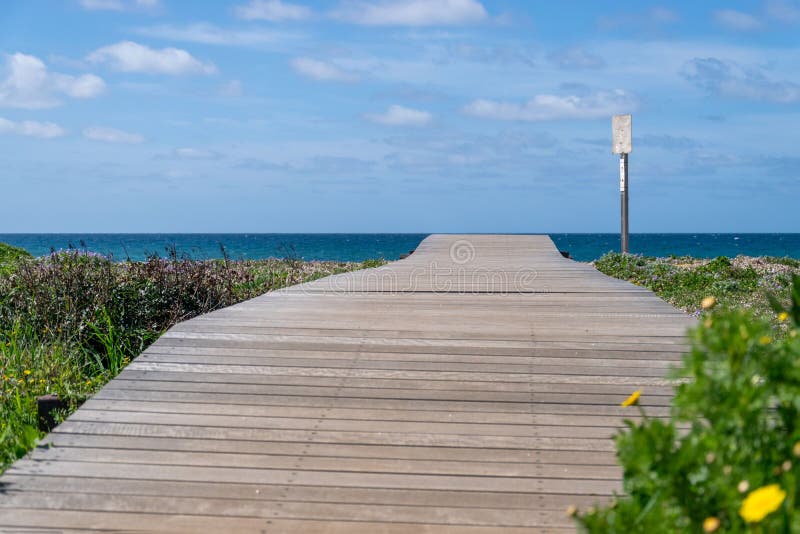 Long Wooden Pathway on the Beach Stock Photo - Image of wooden, coast ...