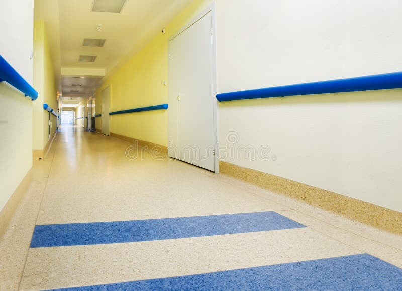 Long Yellow Corridor in Hospital Stock Photo - Image of interior, brown ...